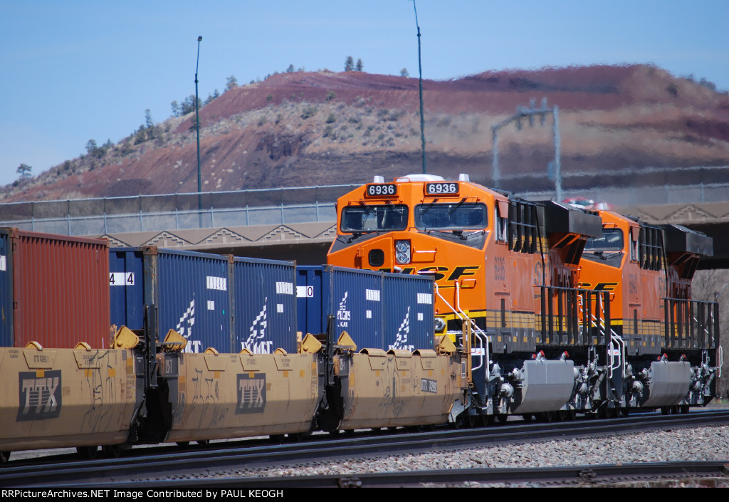 BNSF 6936 and BNSF 6940 push a Double Stack westbound as Rear DPU'S on this Bright Sunny ...